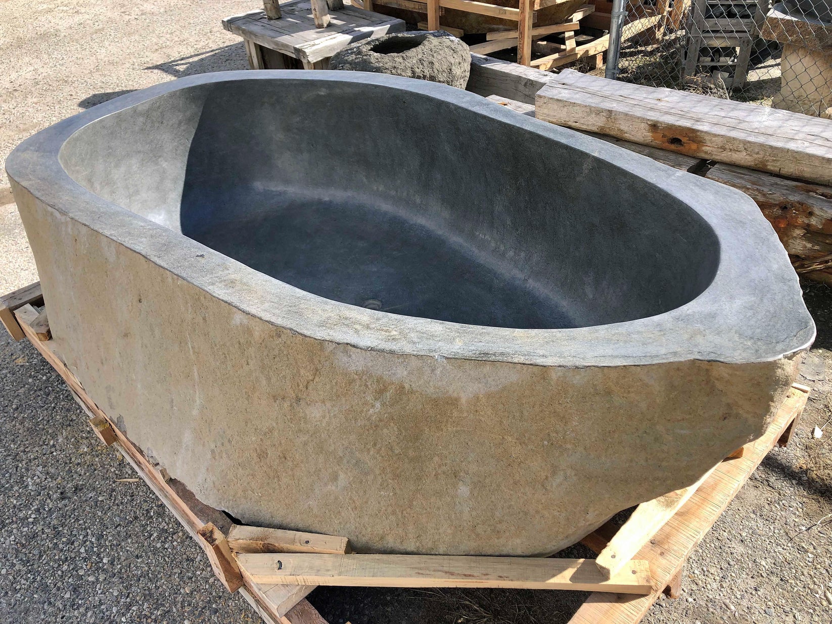 River Boulder Natural Stone Bathtub, Real Rock, from Impact Imports