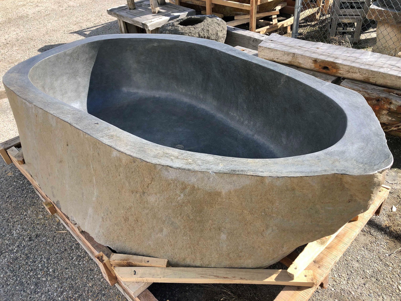 River Boulder Natural Stone Bathtub, Real Rock, from Impact Imports