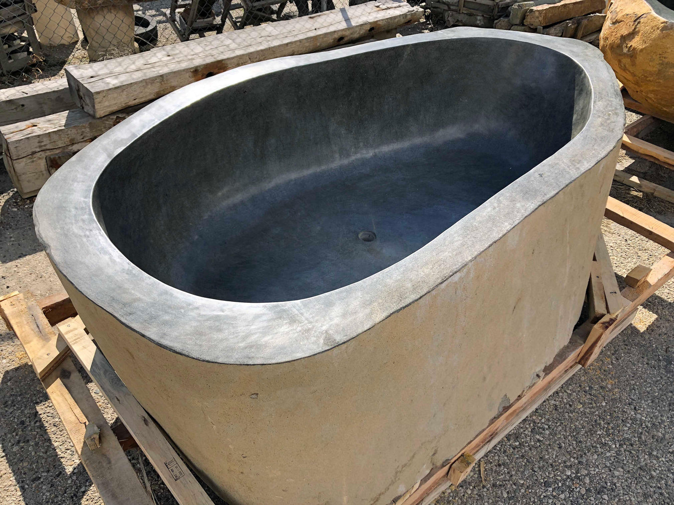 River Boulder Natural Stone Bathtub, Real Rock, from Impact Imports